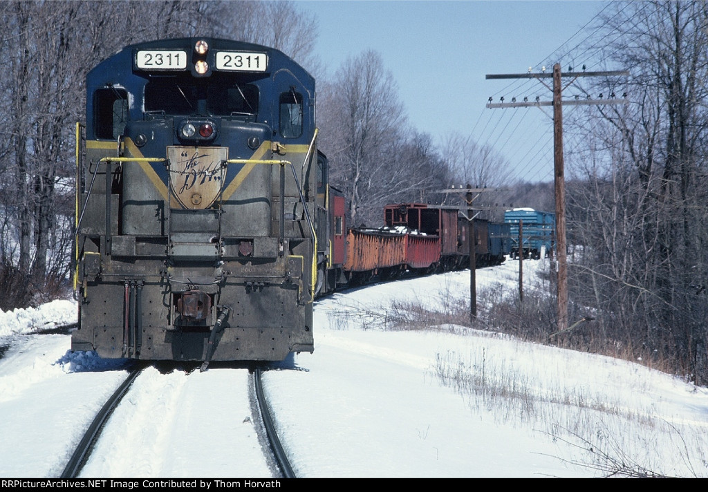 DH 2311 leads a work train to clean up the derailment of D&H train RW6